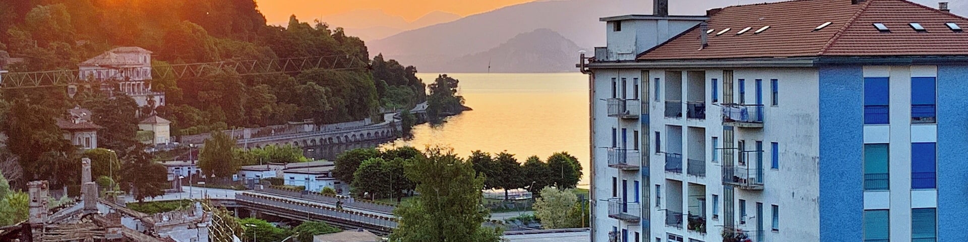 Luxurious penthouse view of sunrise Intra on Lake Maggiore. This Cordo Lorenzo CobIanchi condo has million $ views!