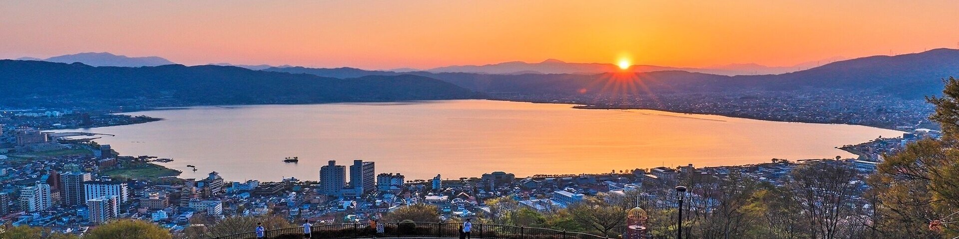 Tateishi Park is a good place to see the sunset over the Lake Suwa in Nagano of Japan.