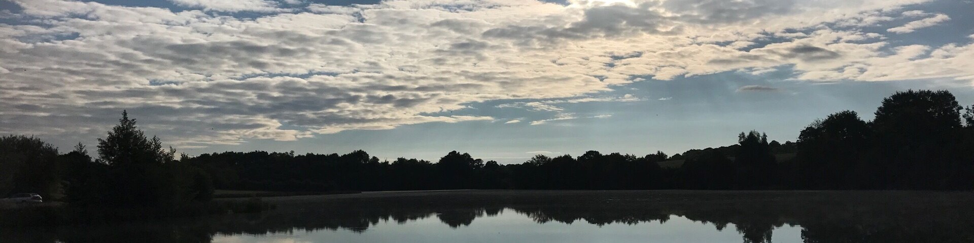 Lake at Chateau Chigy in the silent sunny early morning