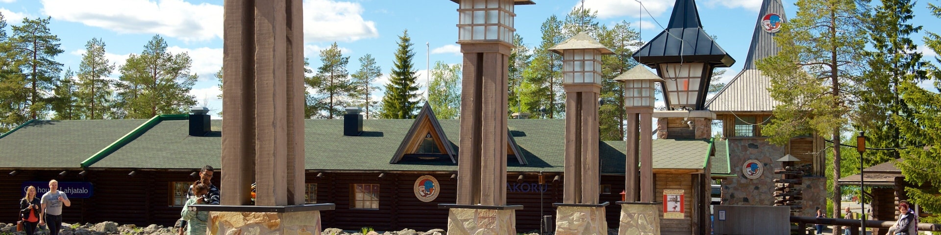 Rovaniemi showing a square or plaza as well as a small group of people