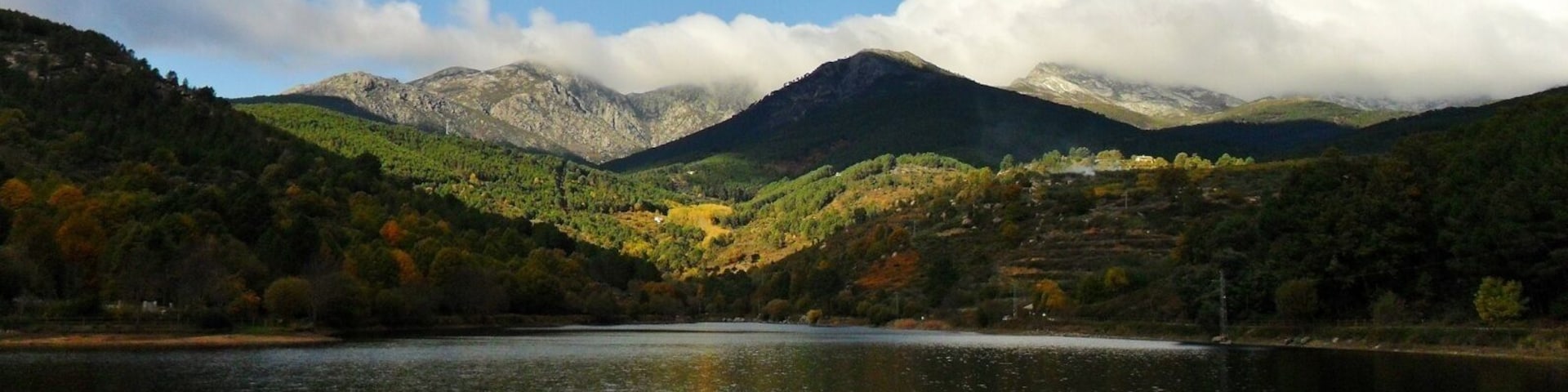 View of the Arenas de San Pedro reservoir and the Sierra de Gredos mountain range at the background.