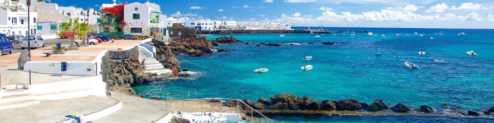 Punta Mujeres featuring a coastal town, general coastal views and boating