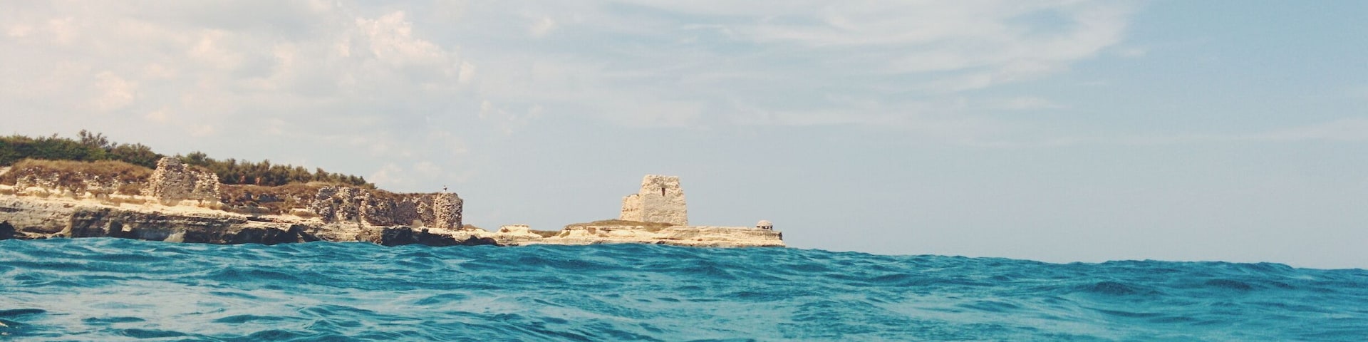 Direclty from the #water: a view of Roca Vecchia's tower! #colorful #sea #blue