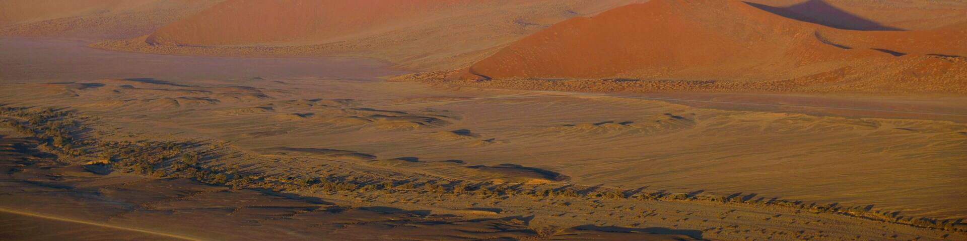 This is a picture I took on my first and only so far hot air balloon ride. It was in Namibia looking over Sossusvlei dunes. They are some of the oldest dunes in the world and how they measure their age is partially dune by the color. The sand here has a tiny amount of iron in it and with a lot of age eventually rusts and that is what that orange color is. This trip was with Namib Sky Balloon Safaris and they had a wonderful trip followed by breakfast by the dunes. Today is the 2 month anniversary of my fathers death and the sadness is nearly overwhelming me, I am trying to fight it off with pictures from past adventures which act as my patronus and remind me of all the beauty and wonder in the world.