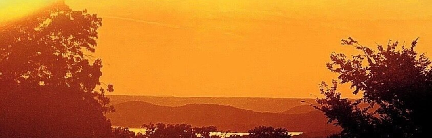 Beautiful yellow, orange, and red sunset at Tablerock Lake!  #LifeAtExpedia