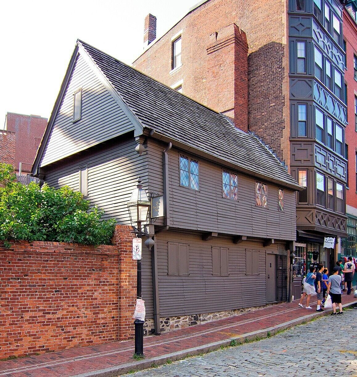 Built in 1680 after the Great Fire of 1676 destroyed a previous residence, this two-story townhouse was purchased by Paul Revere in 1770.  He moved here with his wife, five children, and mother, but by the time he sold the house in 1800 he was on his second wife and had fathered a total of 16 children!
The house is typical of early Massachusetts Bay timber construction, and it's Boston's only surviving 17th-century dwelling.  The house is L-shaped with the kitchen in the back, and it is likely that Revere passed through the kitchen door to begin his famous midnight ride on April 18, 1775.
To save the building from demolition, Revere's great-grandson purchased it in 1902 and restored it to it's early eighteenth-century appearance.  Despite the years, ninety percent of the structure is believed to be original timber.
Today the house is operated as a small non-profit museum with an entrance fee of $3.50.