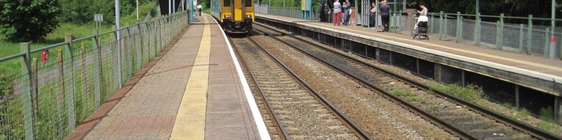 Ystrad Rhondda railway station, Rhondda Cynon Taf. Opened in 1986 by British Rail on the line from Cardiff to Treherbert. View north west towards Ton Pentre (the original Ystrad Rhondda station which changed its name at the same time as this station opened) and Treherbert.