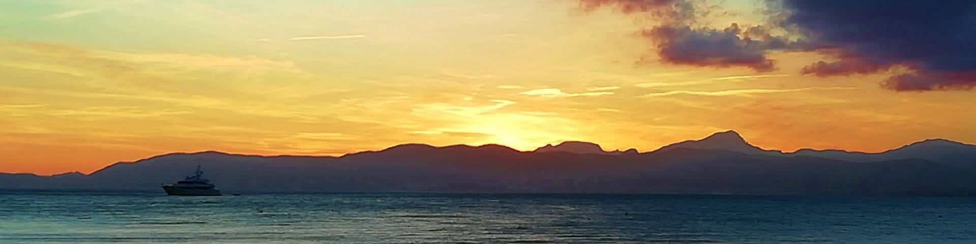 Sunset from El Arenal, favourite side of German tourists and opposite is Palmanova and Magaluf favourite side of English tourists. But we Finnish love both sides.