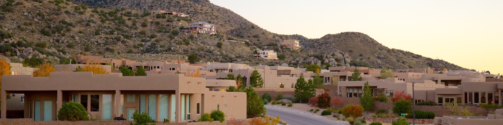 Salt Missions Trail which includes a sunset, a small town or village and landscape views