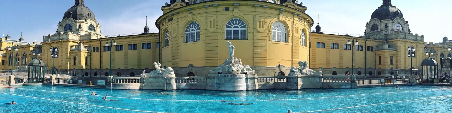 You can swim laps in the warm crystalline aqua waters at Széchenyi Baths while marveling at the baroque buildings and cool down with a beer in the spa afterwards. #BVSBlue