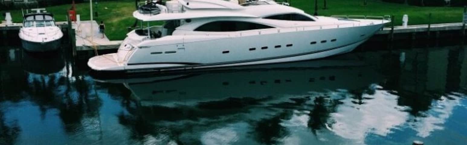 The Porto Vita condos have a great view of this dock. (that yacht is huge and I'm obsessed)