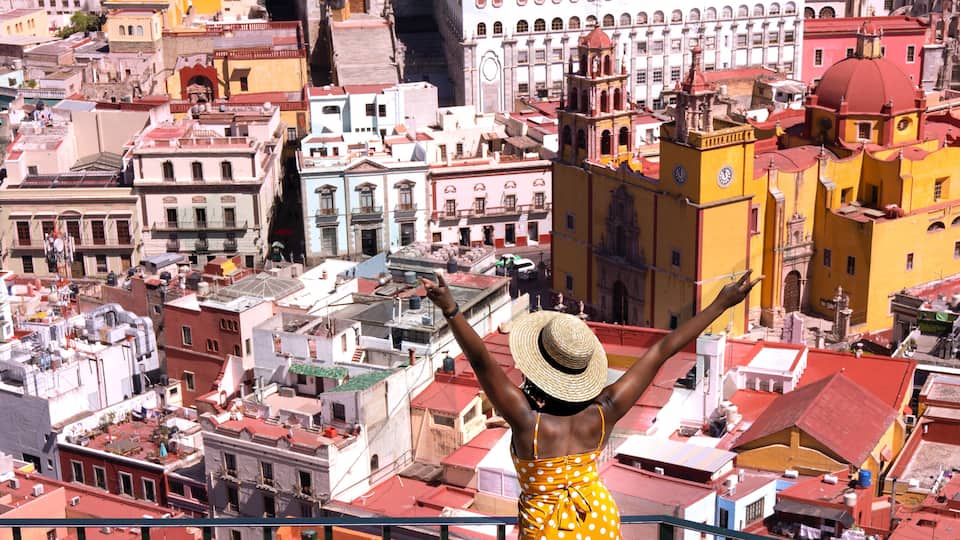 The walk up to Pipila viewpoint will take your breath away because it's steep but it's well worth it. Go before noon when the sun makes the buildings shine!