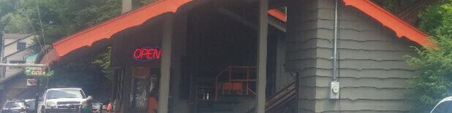 Hillbilly Golf - A unique take on tourist area mini golf. Players ride a motorized incline up the hill to begin the course and proceed to play their way back down.