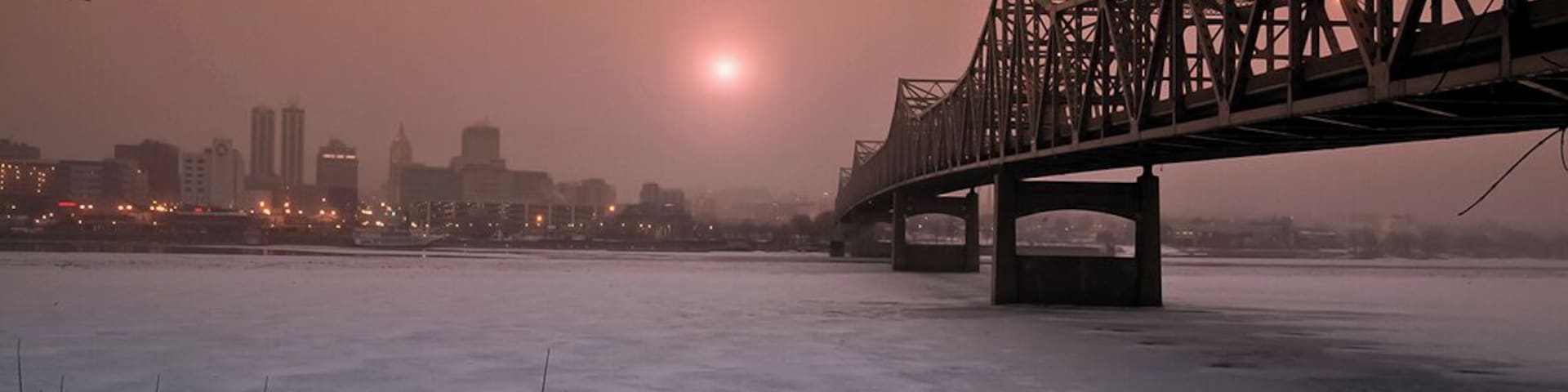 Rising Sun in Winter *A Popular Landmark*
#Murray Baker Bridge
#Peoria
#Chicago
#Illinois
#USA
#Sunrise
#Landscape
This location is the highest crime area in Peoria, actually I put myself in high risk while capturing this photo. That day I arrived this place at 5am in early morning purposely waited for sunrise, the temperature was so cold and below zero. A patrol car suddenly stopped me, the police officer asked me to leave this place immediately. I told the police officer "Please allow me to take at least one sunrise photo, I spent 3 hours drove from my home to here". Ended up the police officer accompany me for protection till I done, really thanks to the police officer :) Rising sun at dawn in winter, photo captured in a freezing cold morning under Murray Baker Bridge, Peoria Illinois USA.
Photo Licensed by iLOVEnature's Photography Inspiration l All rights reserved