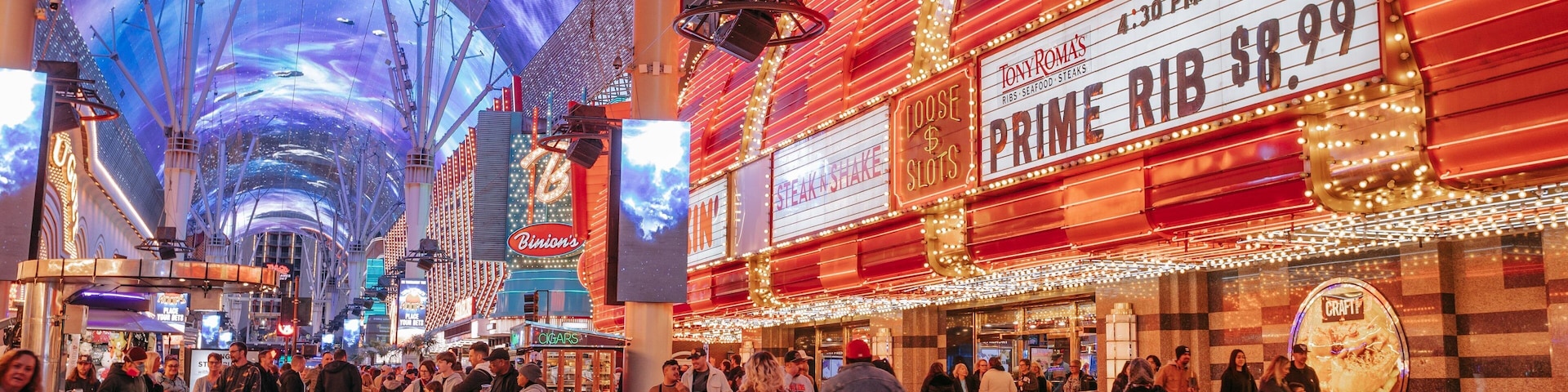 Downtown Las Vegas which includes signage, night scenes and street scenes