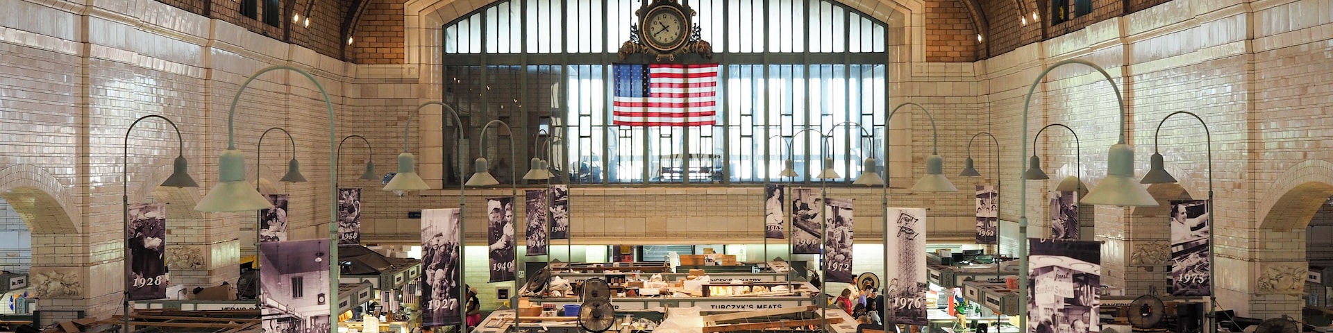 The West Side Market is home to dozens of vendors selling everything from fresh meat and produce to yummy baked goods to all sorts of specialty foods. It’s not just a fun place to take tourists, but also a place where locals frequently do their shopping.
To get this classic overhead view of the inside of the main market building, there’s a stairwell near the restrooms at the market’s entrance on W 25th. A quick flight of stairs, and you’ll be on the second-floor balcony with this great view.