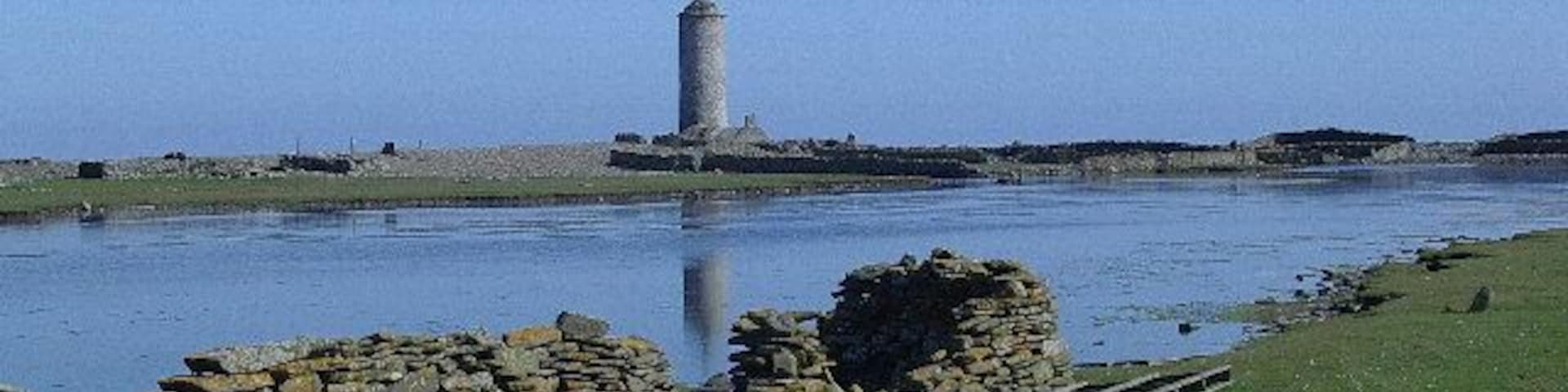 North Ronaldsay. The old beacon seen across Dennis Loch.