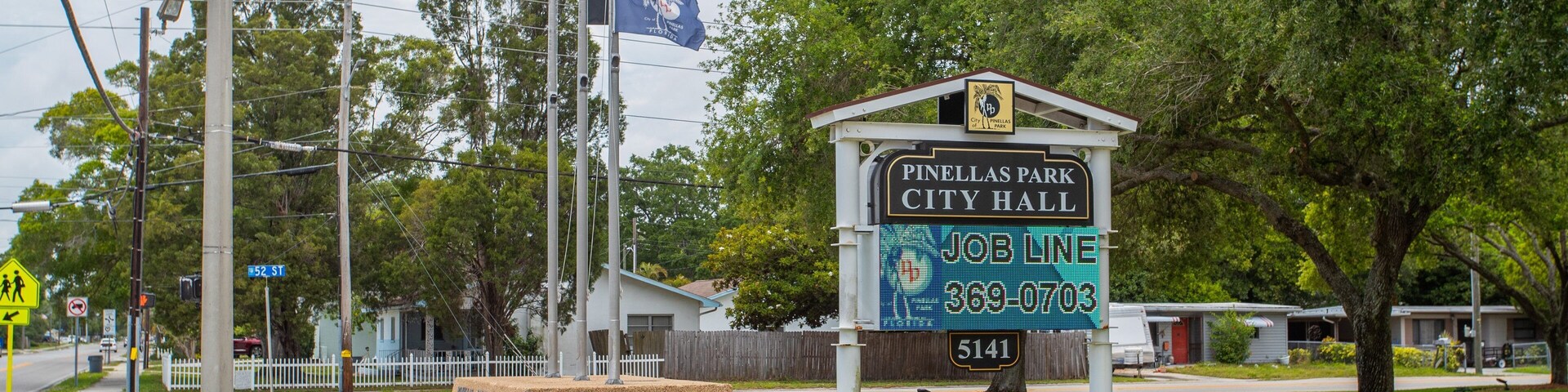 Pinellas Park which includes a park and signage