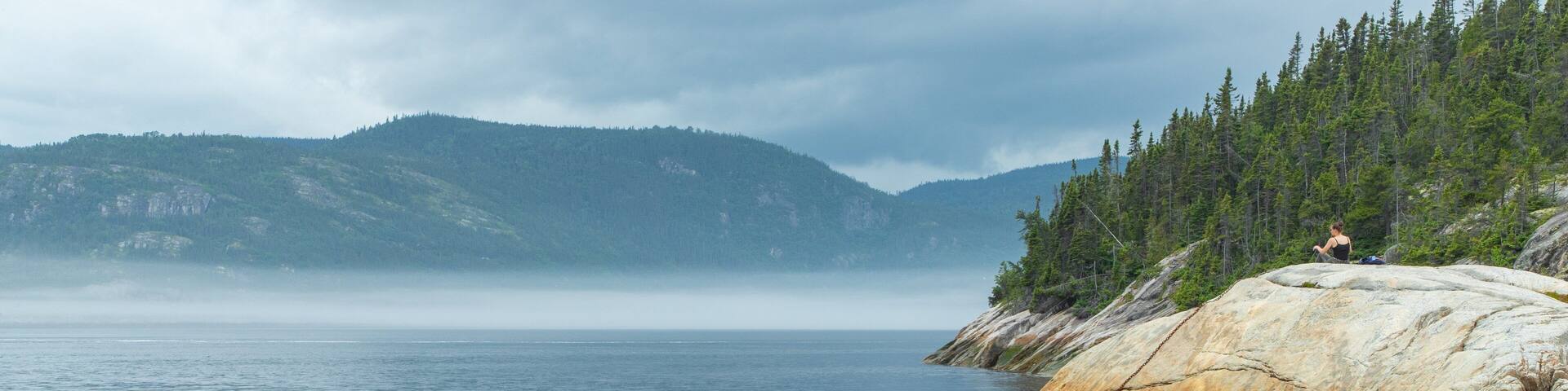 Tadoussac which includes a lake or waterhole