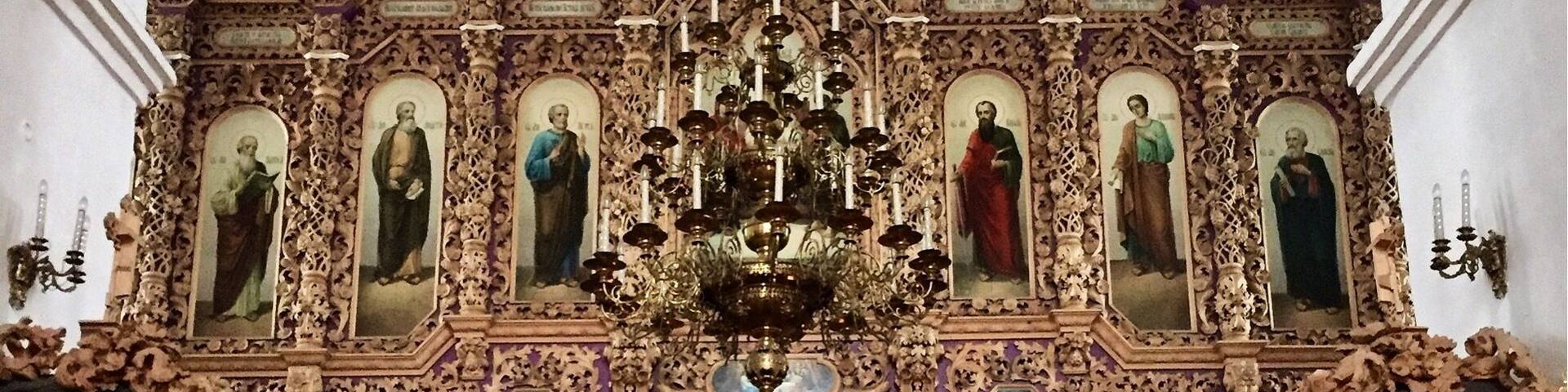 Instead of gold covered, the iconostasis and everything inside the church is delicate, intricately carved wood.