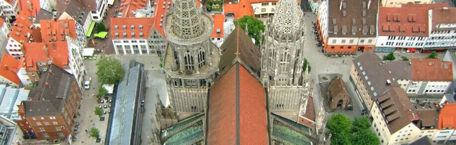 Looking down upon Ulm from half way to the top of Ulm Minster.
Construction started in 1377 and it was completed in 1890. Incredible history. There are 768 steps to the top and the stair case is one tight spiral, for both directions. Not much causes me to get dizzy but I did have to stop a few times. There are little windows to look out over the city and of the Danube. Even if you are scared of heights, do this. You will not be disappointed.
